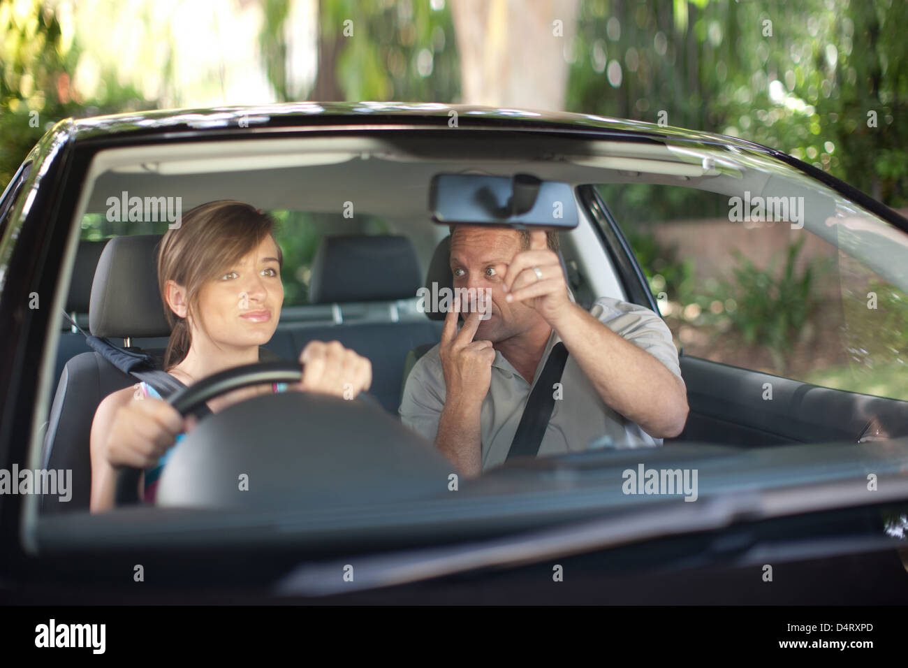 Father teaching daughter driving hi-res stock photography and images ...