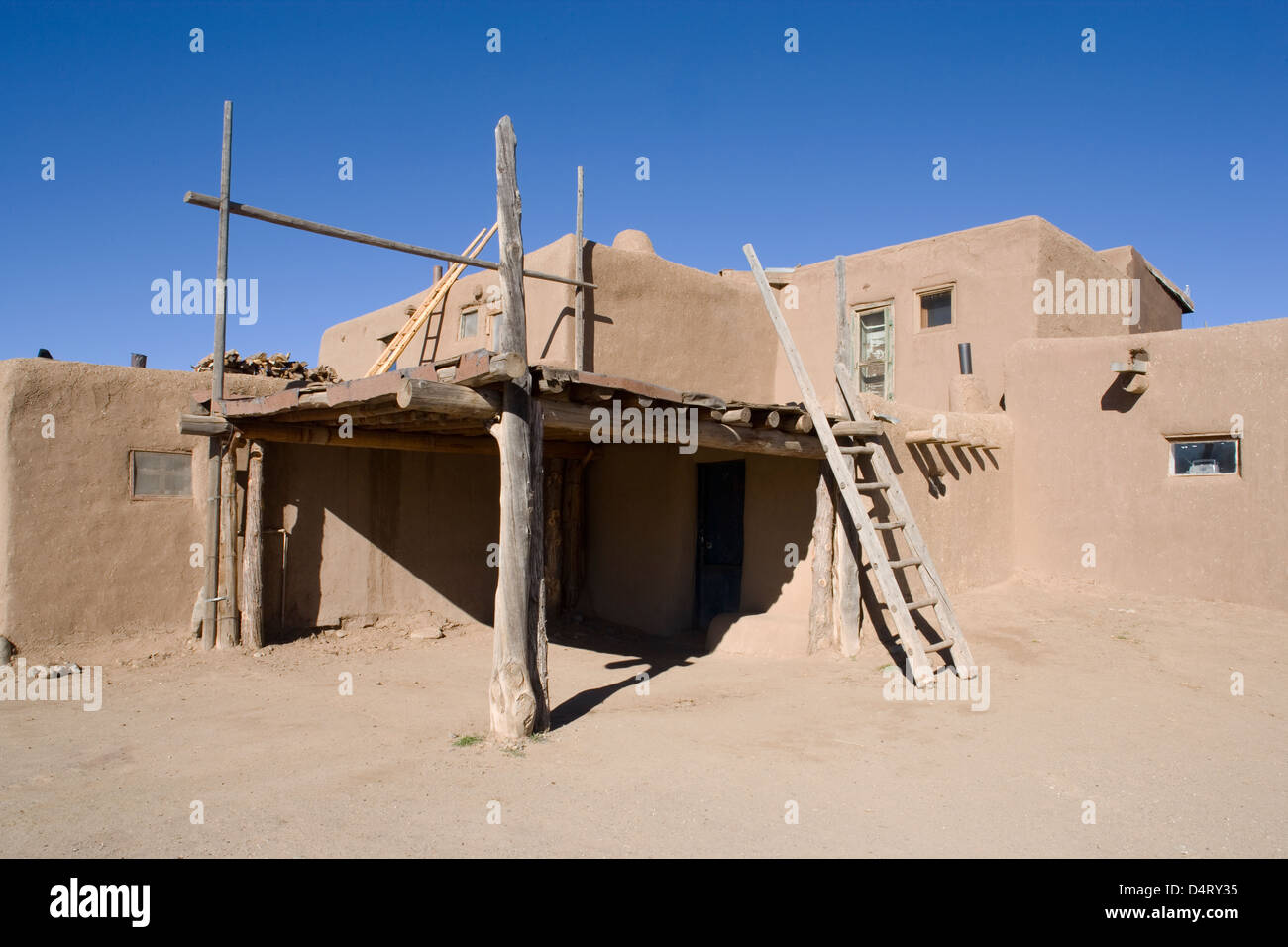 Taos: Pueblo - building with ladder Stock Photo - Alamy