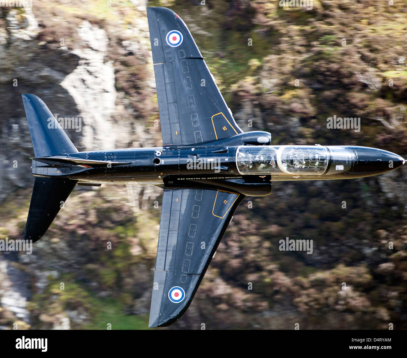 A Hawk jet trainer aircraft of the Royal Air Force low flying over ...