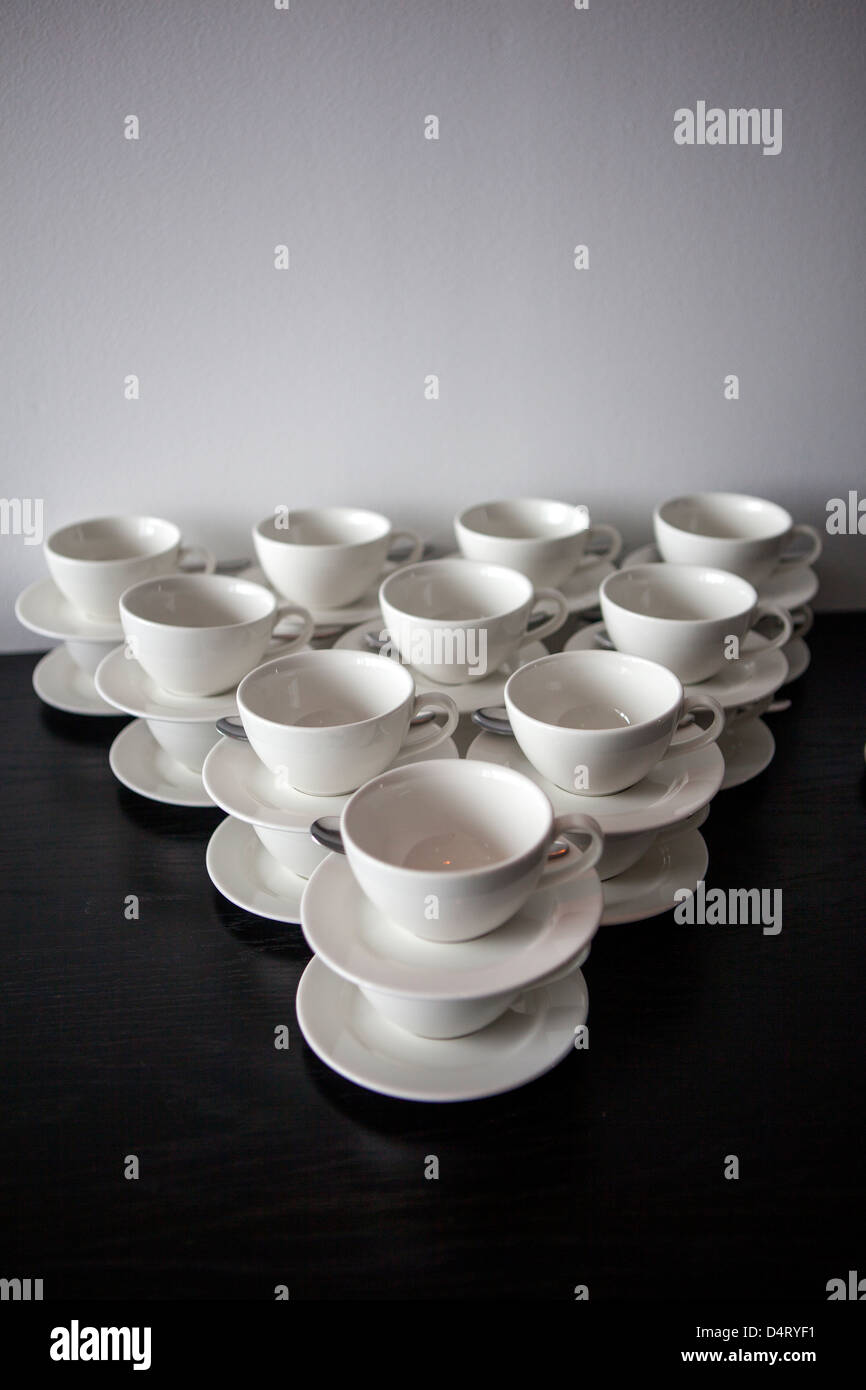 A stable of tea cups in a restaurant in London Stock Photo - Alamy
