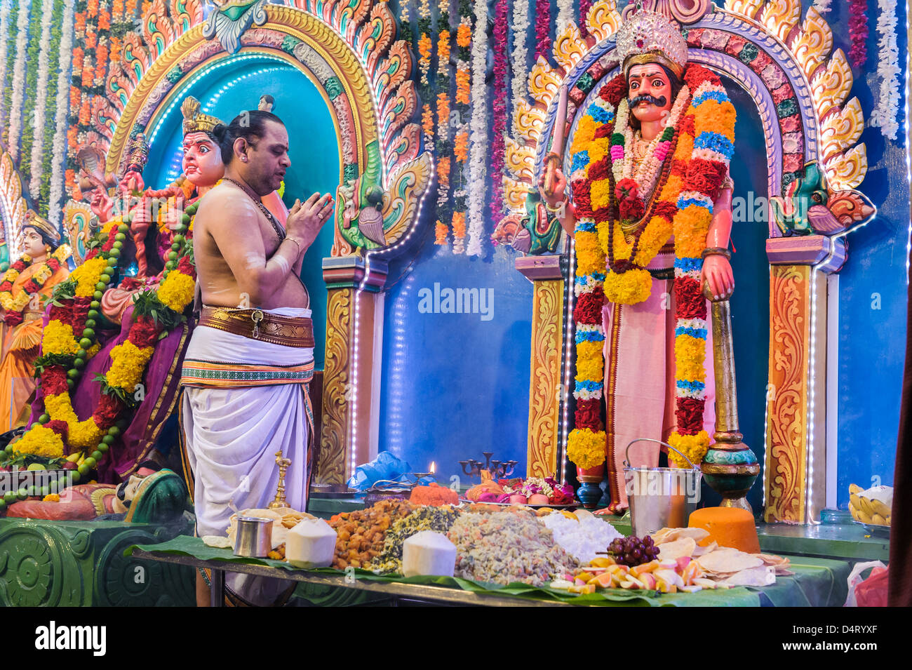 Priest performing a hinduist ceremony, Singapore, Asia Stock Photo - Alamy