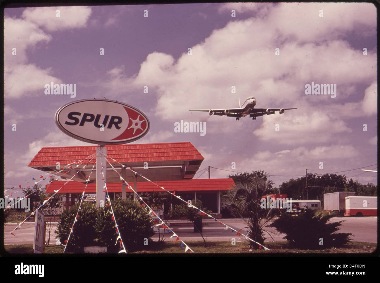 A photograph of a Delta Air Lines DC-8 aircraft coming in for landing ...