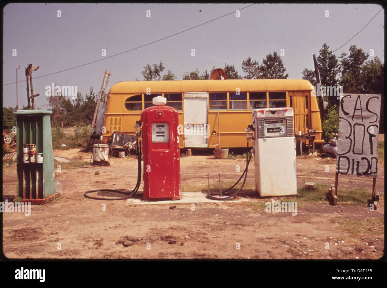 A 1972 image of a cut-rate gas station operating out of a bus in Texas ...