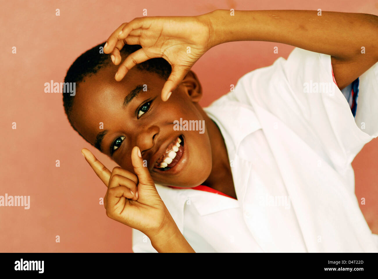 Africa, Angola, Luanda, close-up portrait of a cheerful little African ...