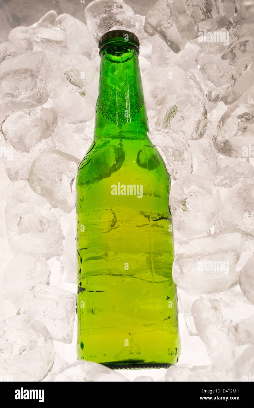 cold beer bottle with ice Stock Photo - Alamy