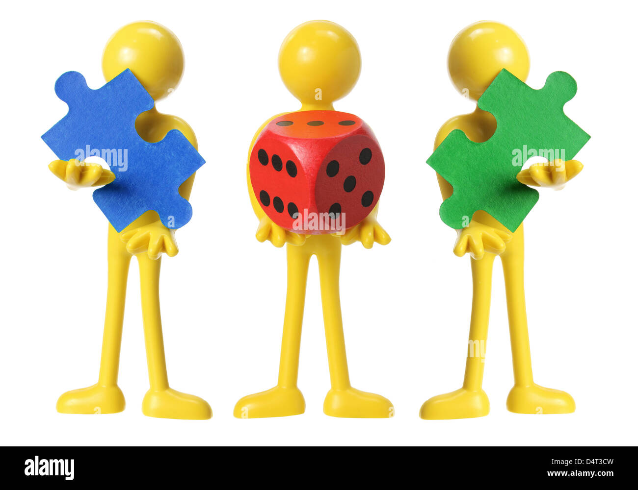 Miniature Rubber Figures with Dice and Jigsaw Puzzle Piece Stock Photo ...