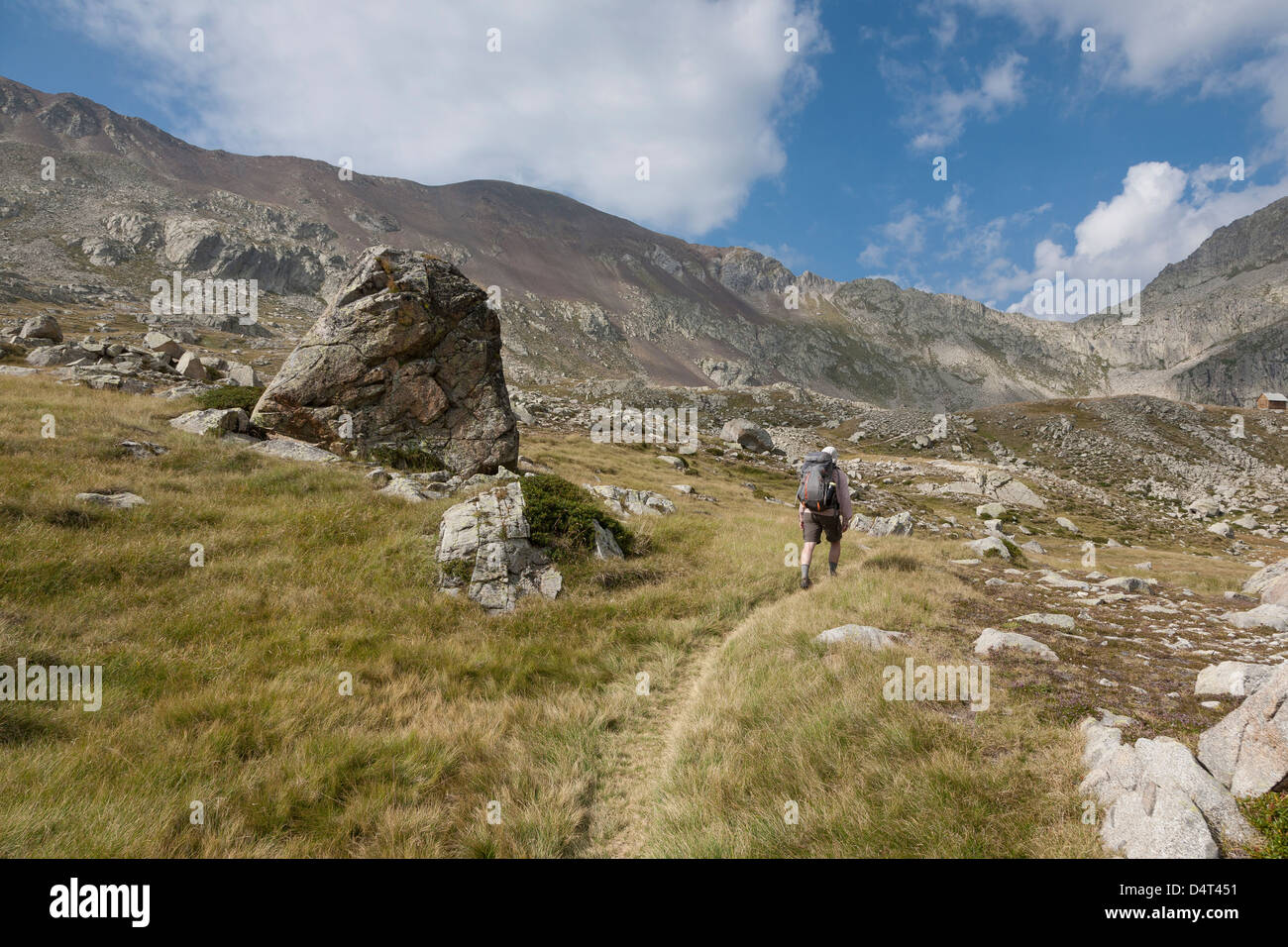 Man Hiking the GR 11 Footpath along the Vall d'Anglos in the Spanish ...