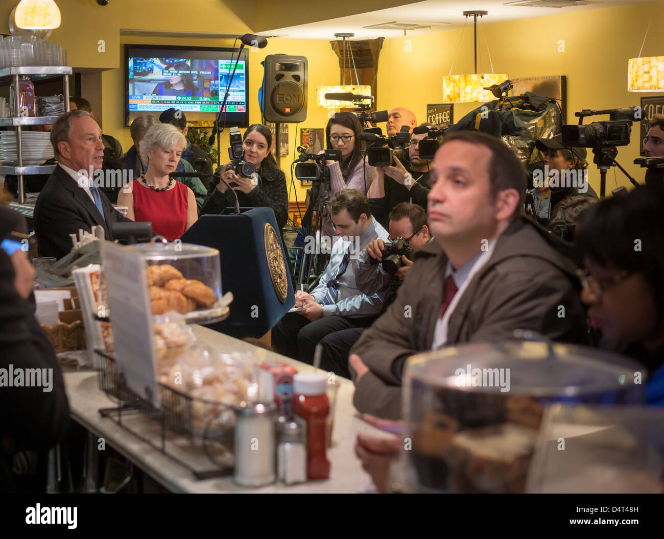 NY Mayor Michael Bloomberg, left, speaks at a press conference in Lucky ...