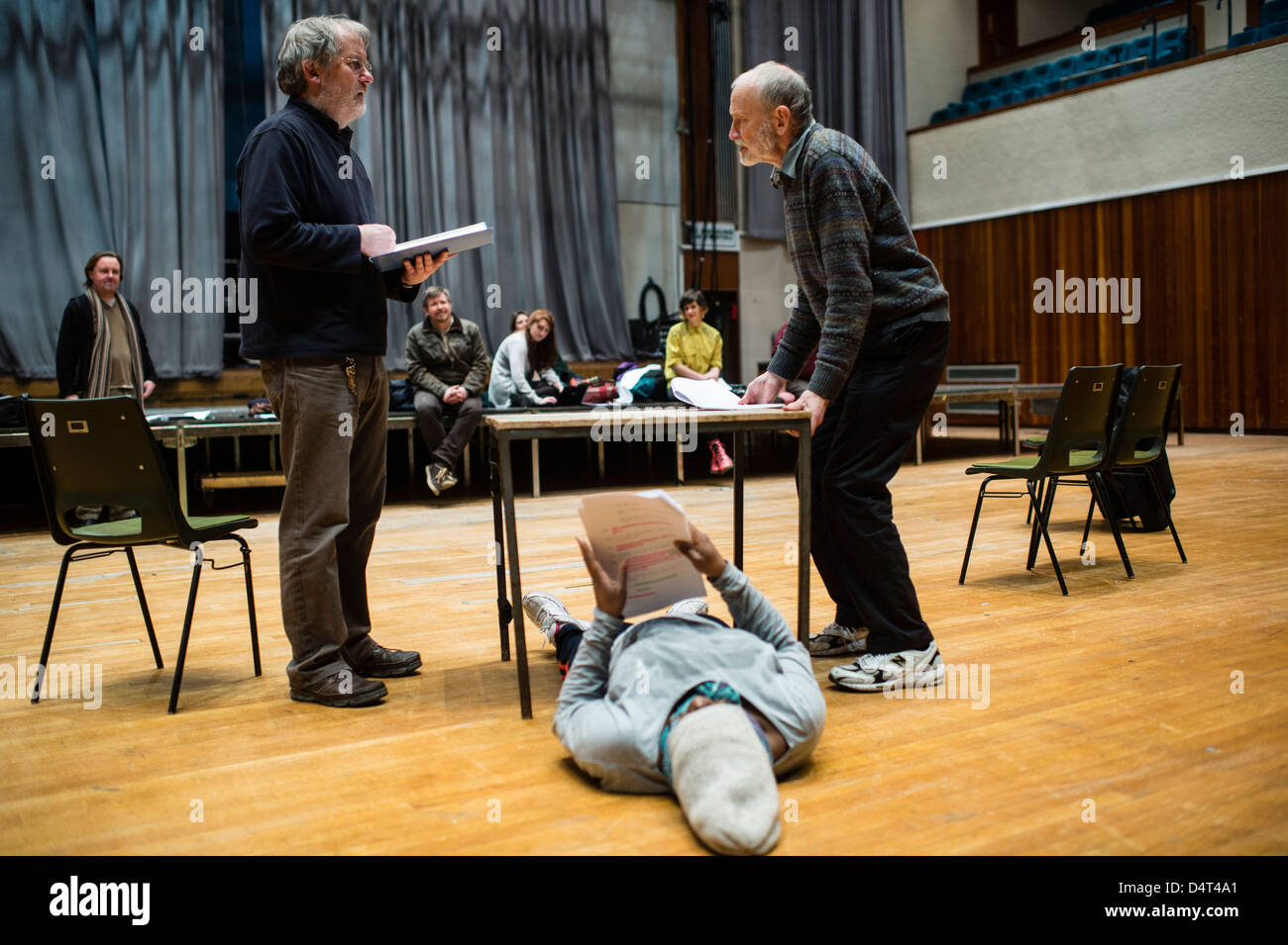 Actors holding their scripts rehearing a new play drama in a theatre ...