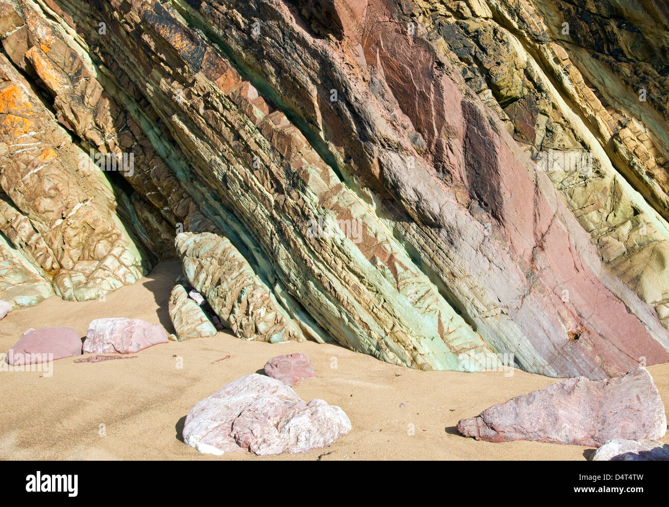 Rock and cliff faces with a varied geology at marloes sands beach ...