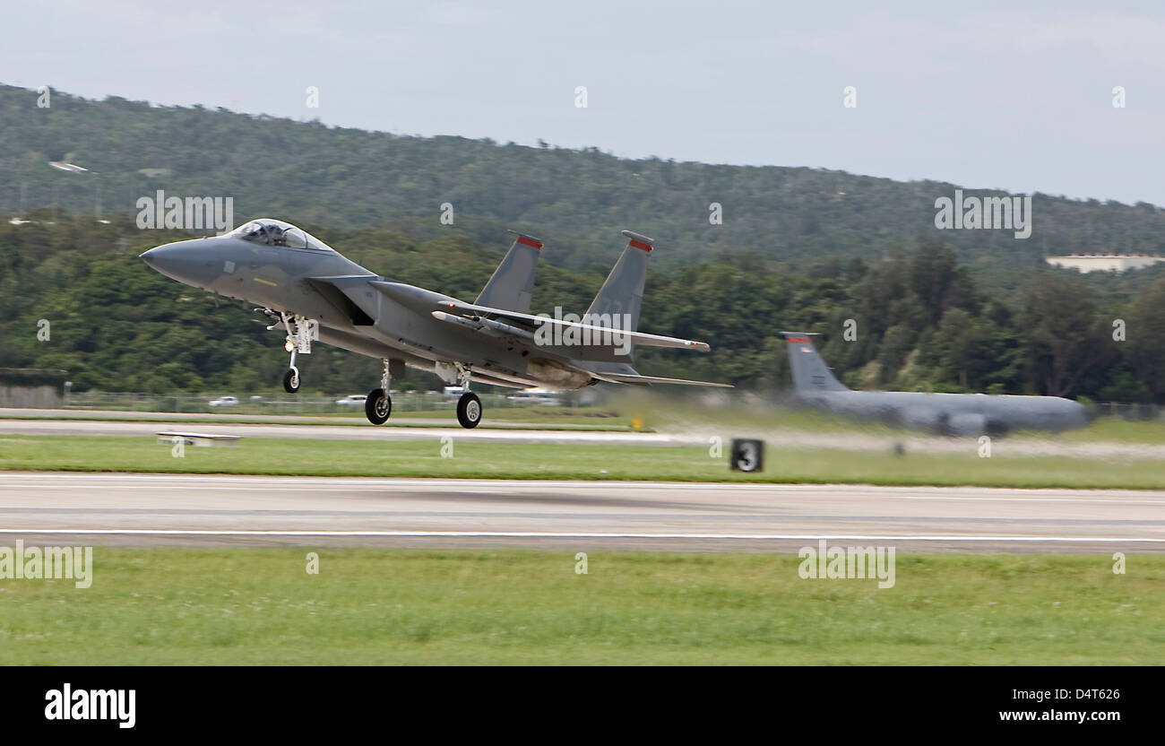 An 18th Wing F-15 Eagle takes off on a training mission at Kadena Air ...