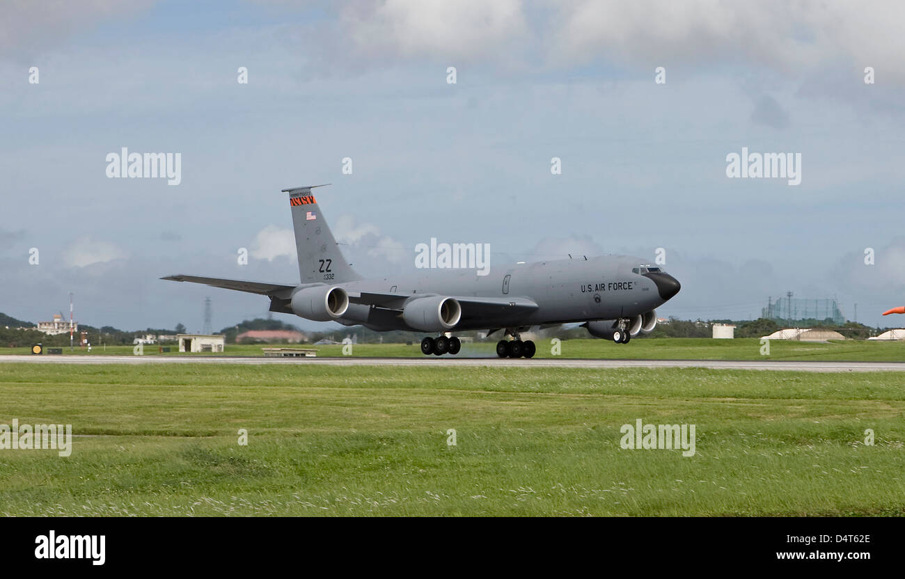 A KC-135 Stratotanker lands on the runway at Kadena Air Base, Japan ...