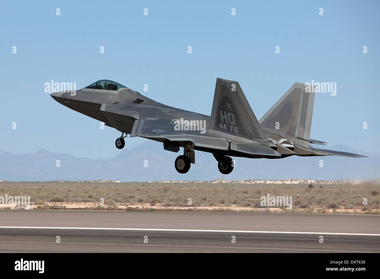 An F-22 Raptor from the 49th Fighter Wing takes off on a training ...