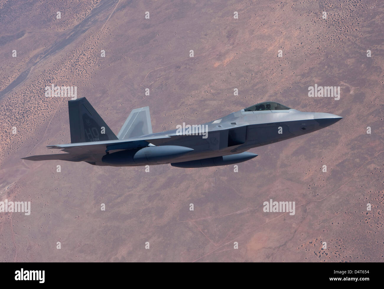 An F-22 Raptor from the 49th Fighter Wing maneuvers while on a training ...