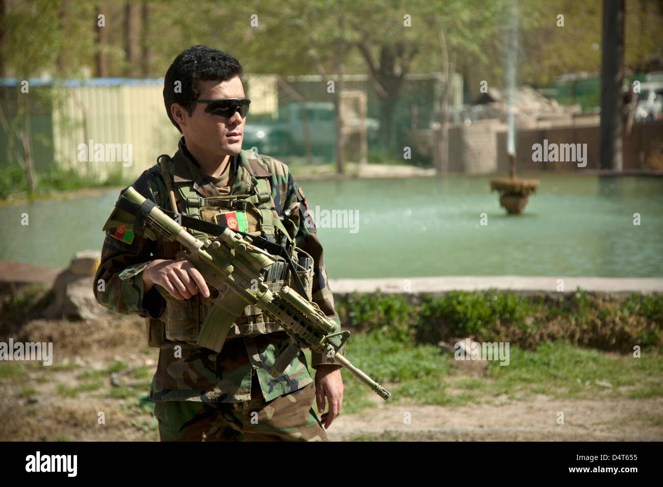 An Afghan National Army Special Forces commando maintains security ...