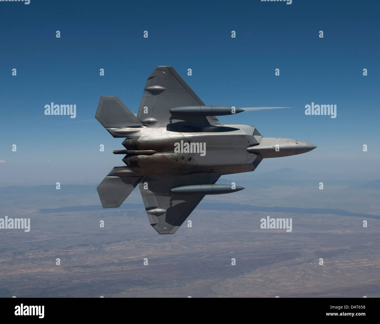 An F-22 Raptor from the 49th Fighter Wing maneuvers while on a training ...