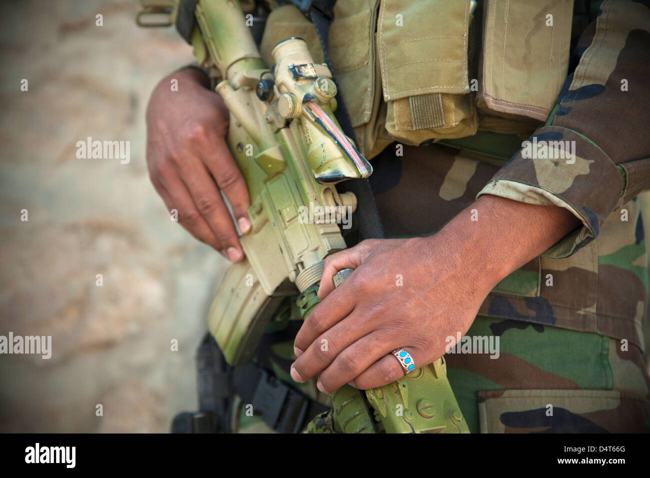 An Afghan National Army Special Forces commando maintains security ...
