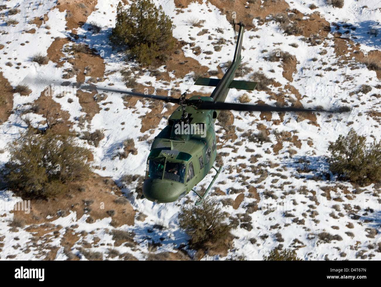 A UH-1N Twin Huey from the 512th RQS flies a training mission near ...