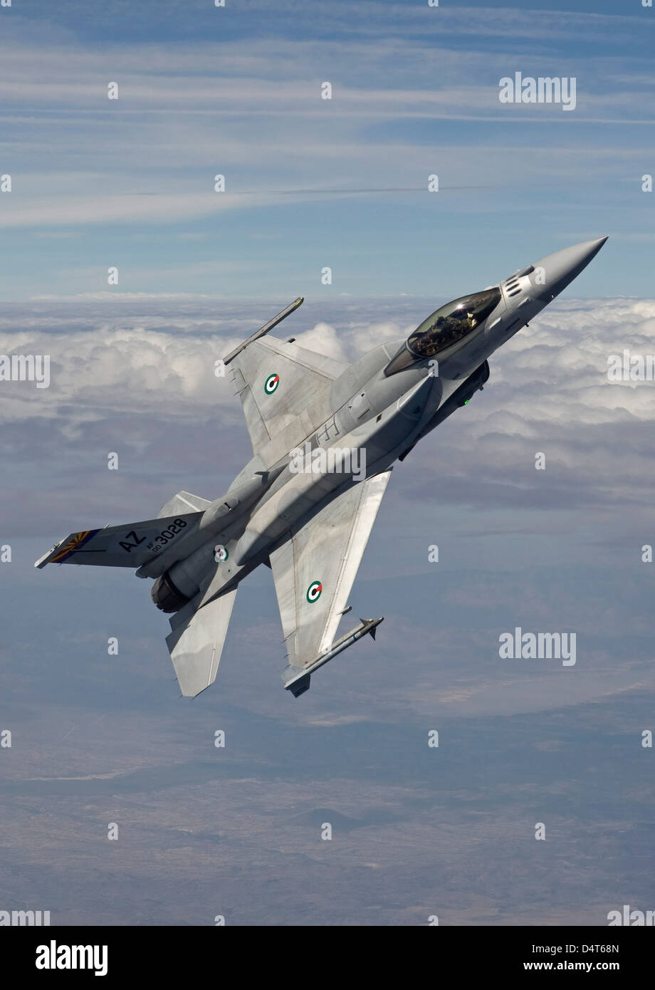 An F-16E from the 162nd Fighter Wing maneuvers during a training ...