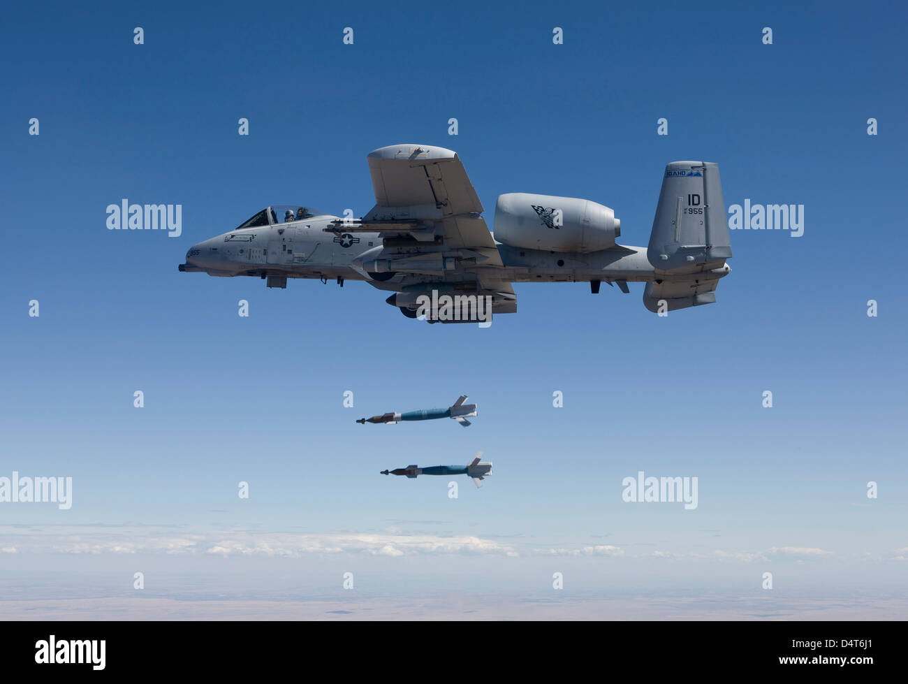 An A-10C Thunderbolt releases two GBU-12 laser guided bombs Stock Photo ...