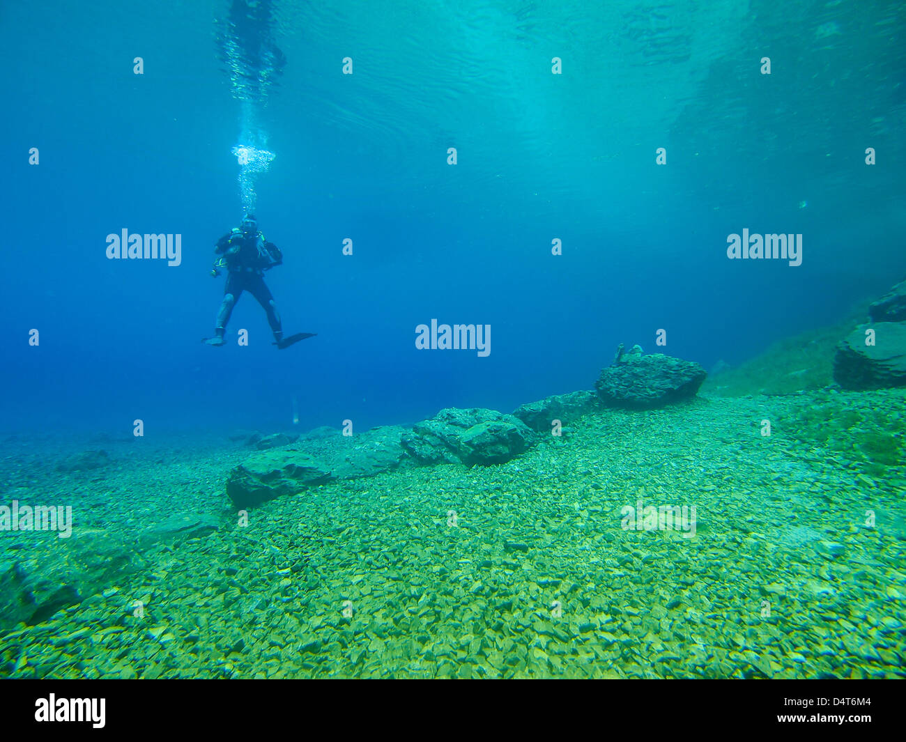 altitude diving in mountain lake Gruener See / gruner see. Austria half ...