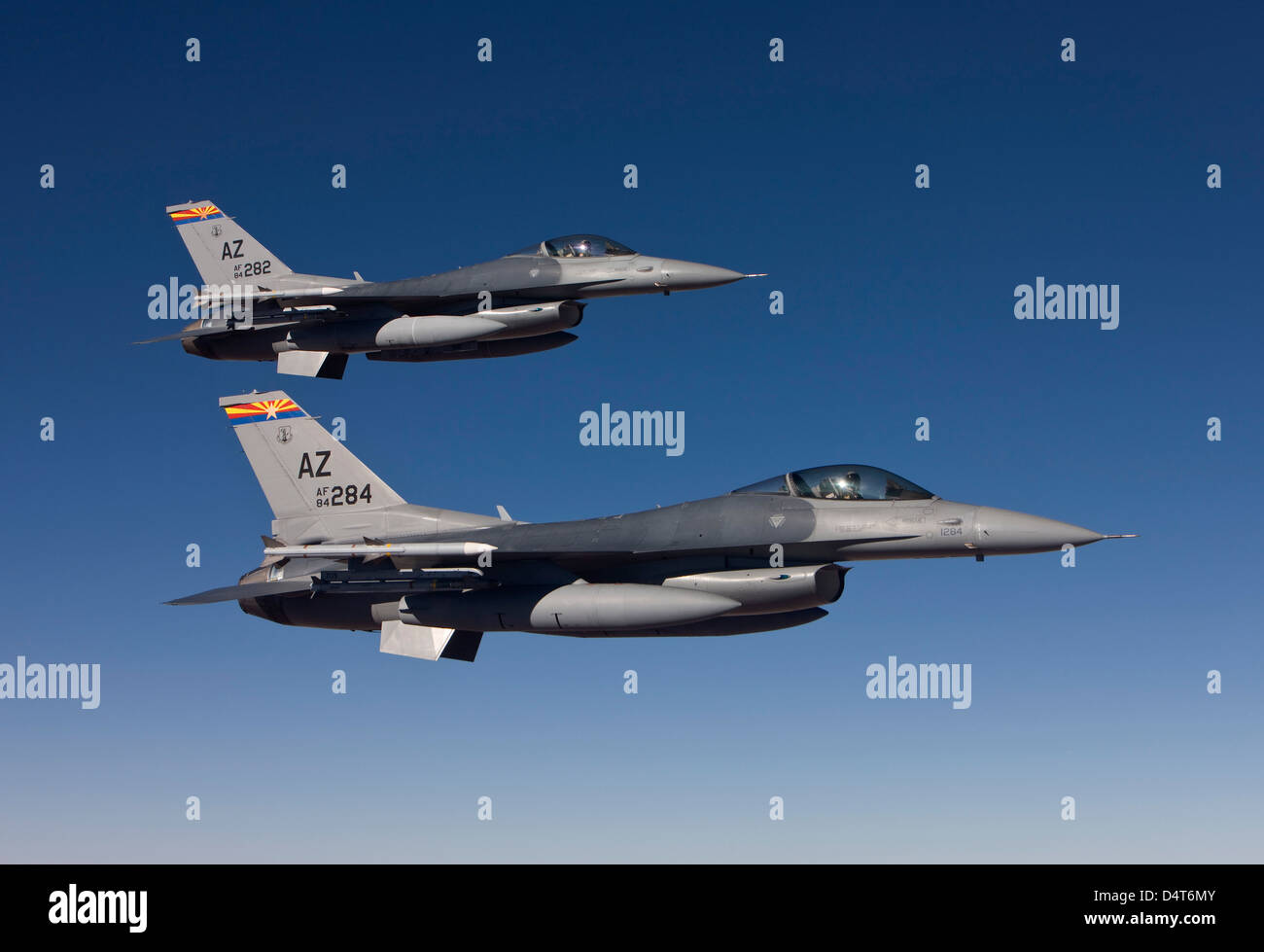 A pair of F-16's from the 162nd Fighter Wing fly in formation during a ...