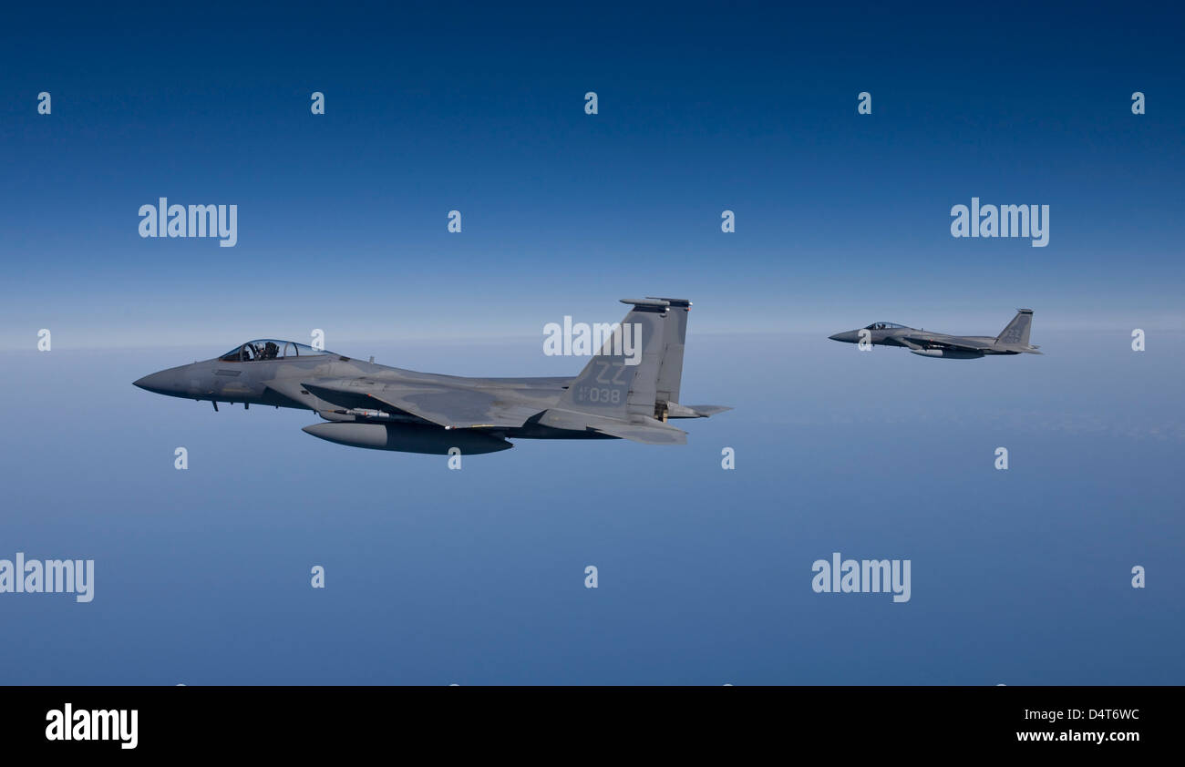 Two F-15 Eagles from the 44th Fighter Squadron fly over the Gulf of ...