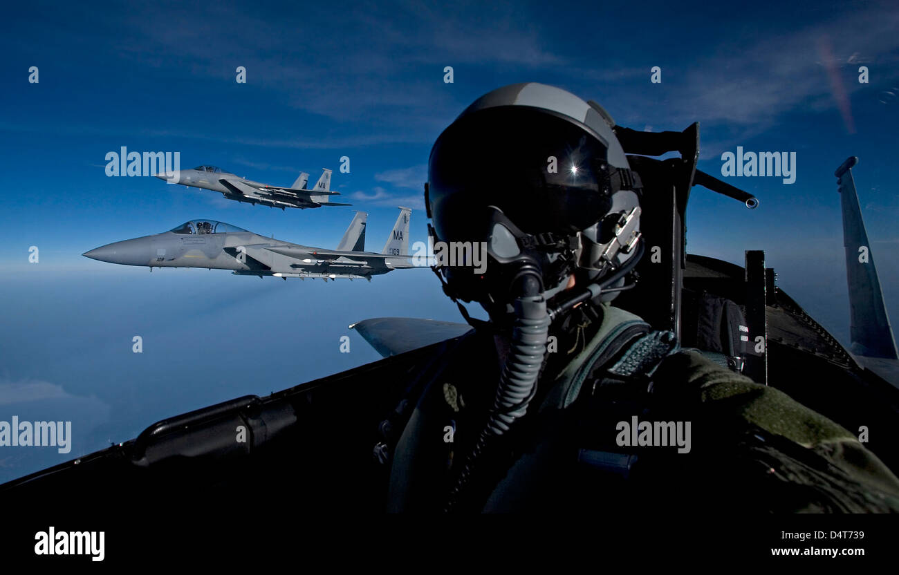 Three F-15 Eagles from the Massachusetts Air National Guard fly high ...