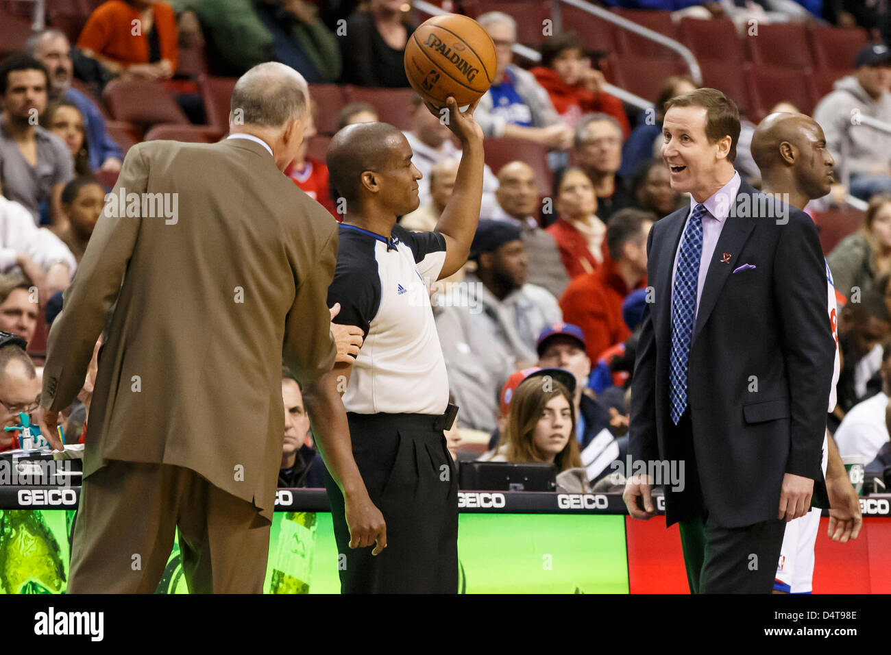 March 18, 2013: Referee Derrick Collins (11) holds up the ball as he is ...