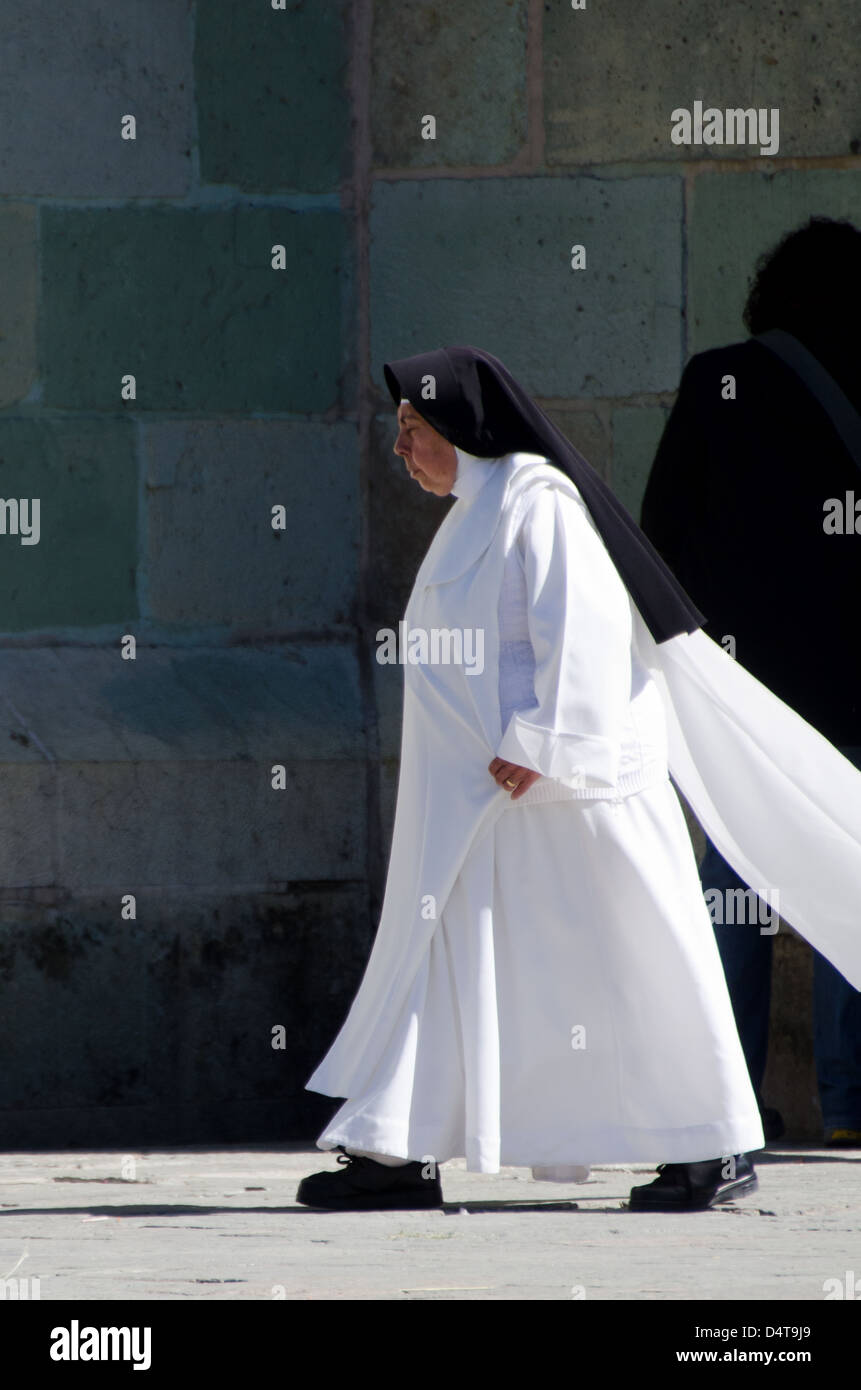 Dominican nun walking past the Catedral de Oaxaca (Mexico Stock Photo ...