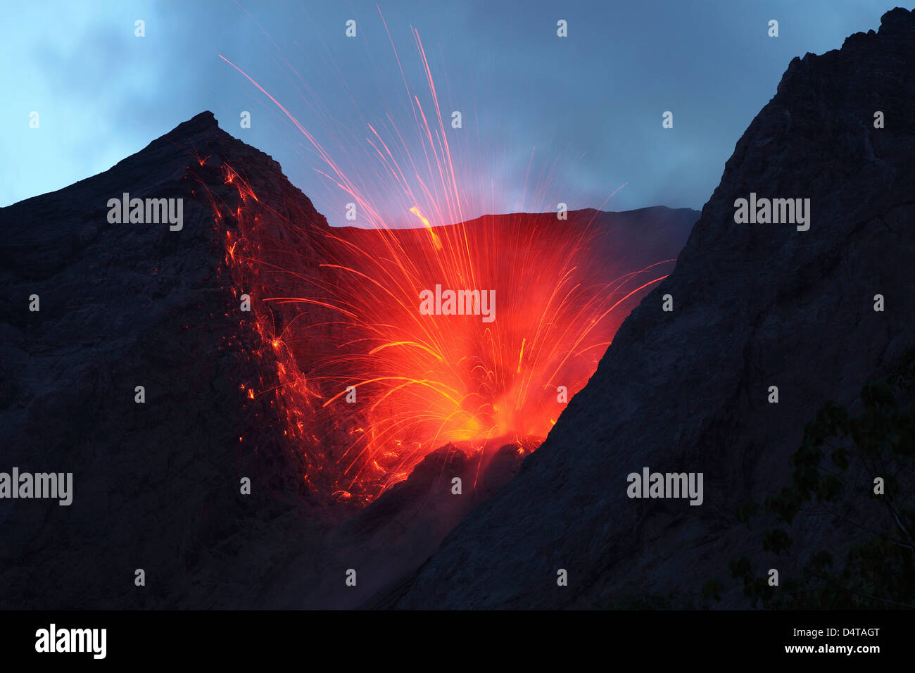 Strombolian type eruption of Batu Tara volcano, Indonesia Stock Photo ...