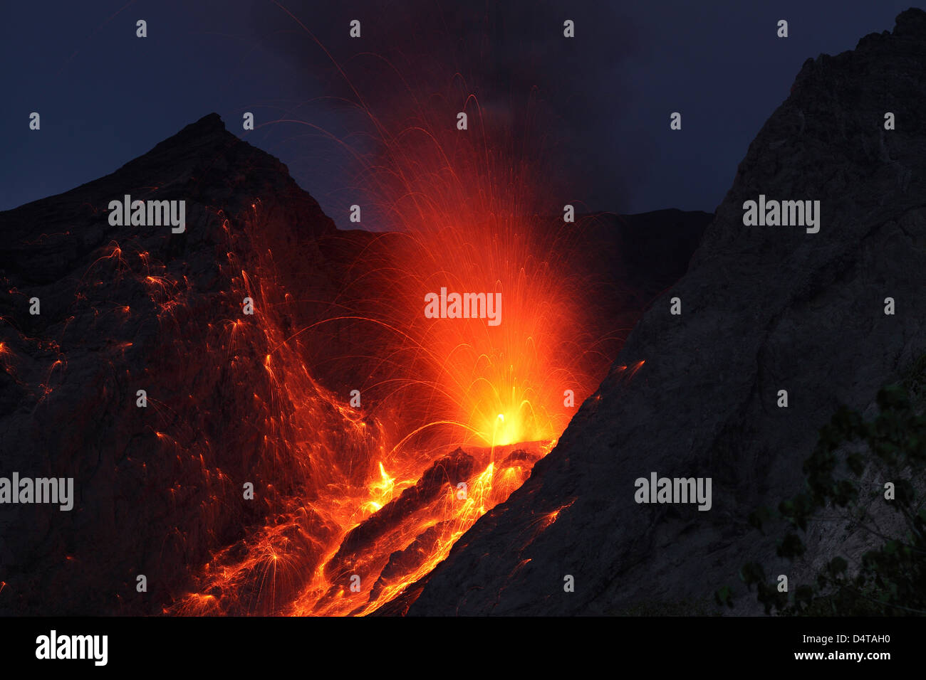 Strombolian type eruption of Batu Tara volcano, Indonesia Stock Photo ...