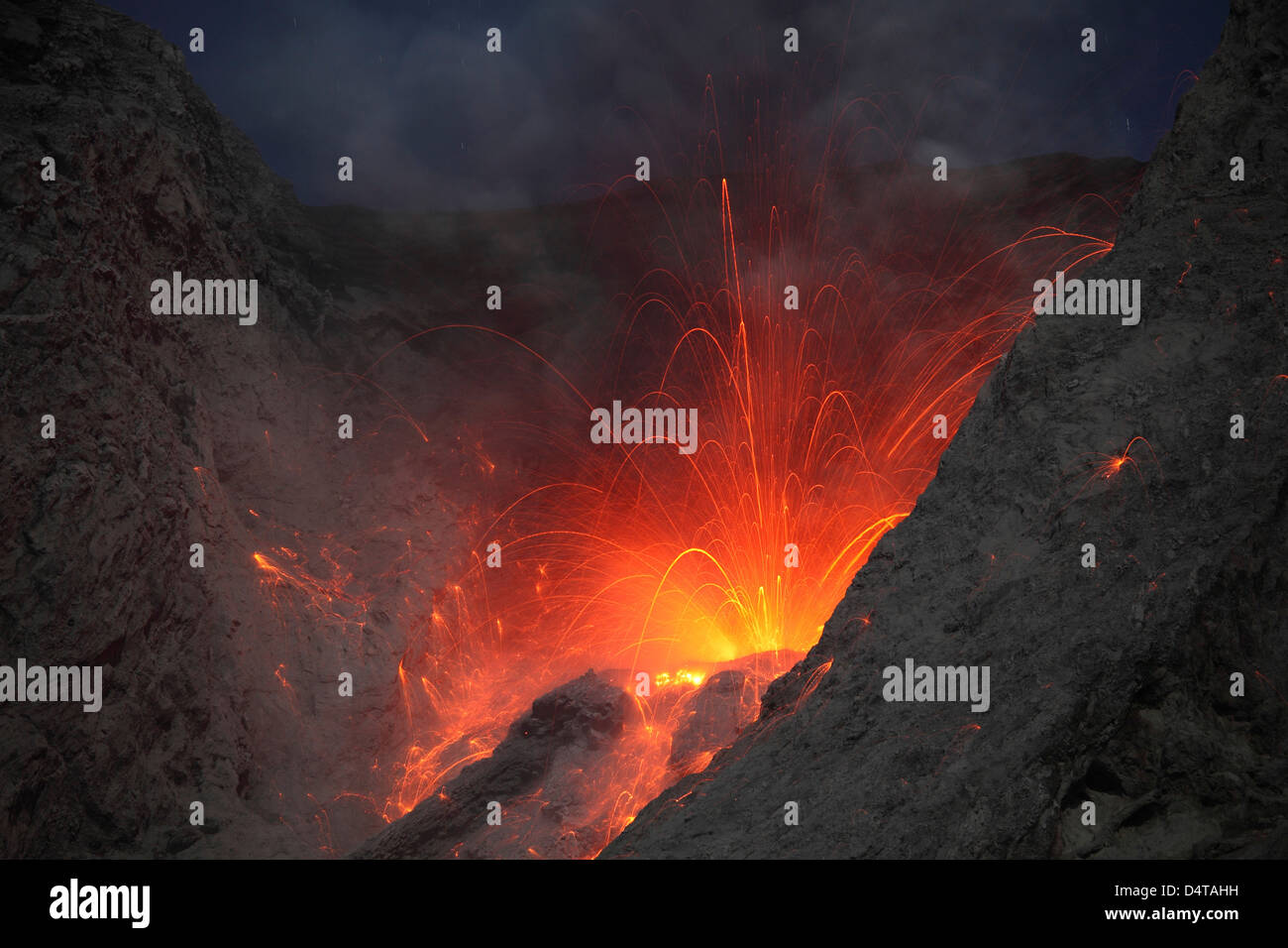 Strombolian type eruption of Batu Tara volcano, Indonesia Stock Photo ...
