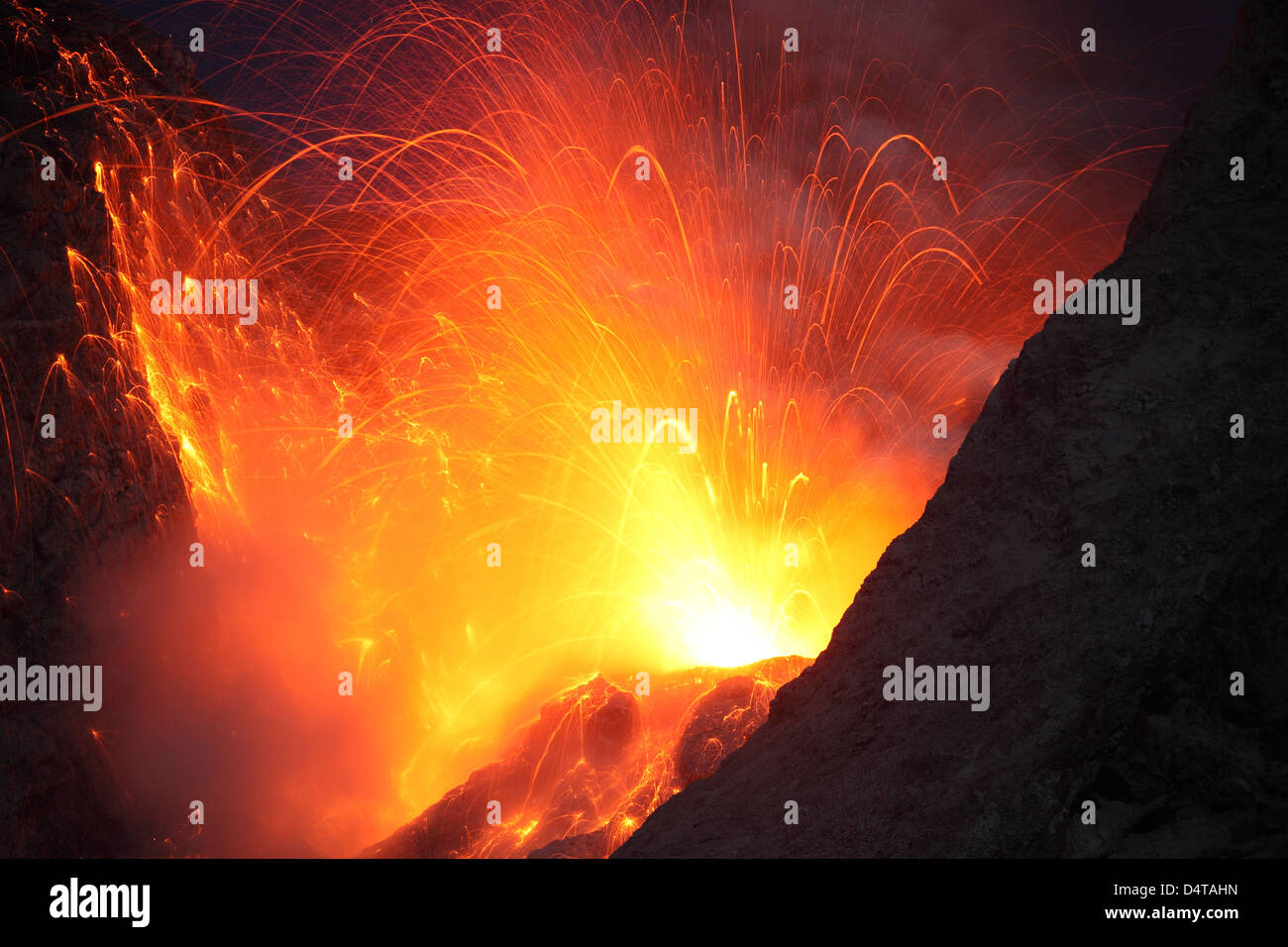 Strombolian type eruption of Batu Tara volcano, Indonesia Stock Photo ...