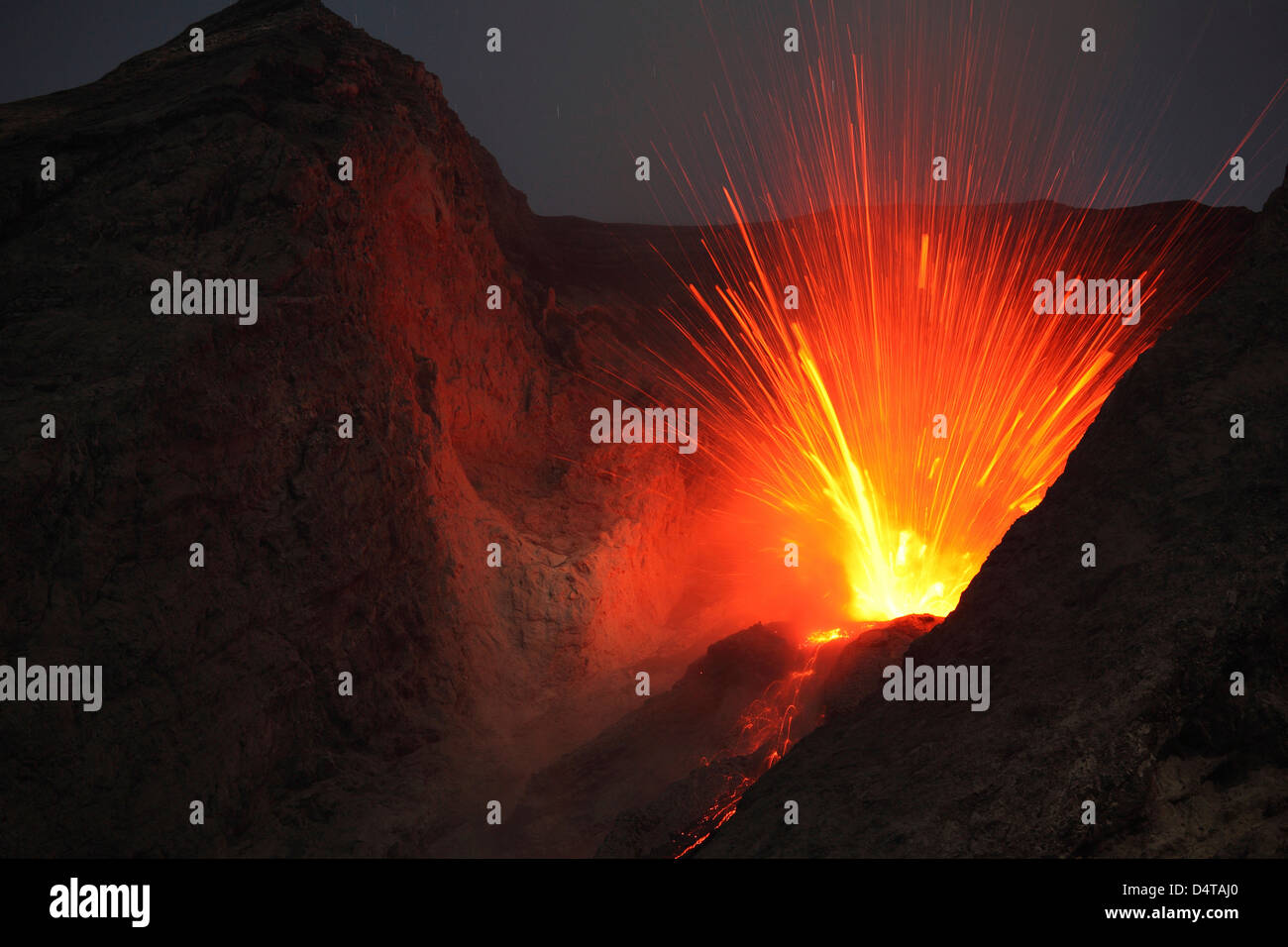 Strombolian type eruption of Batu Tara volcano, Indonesia Stock Photo ...