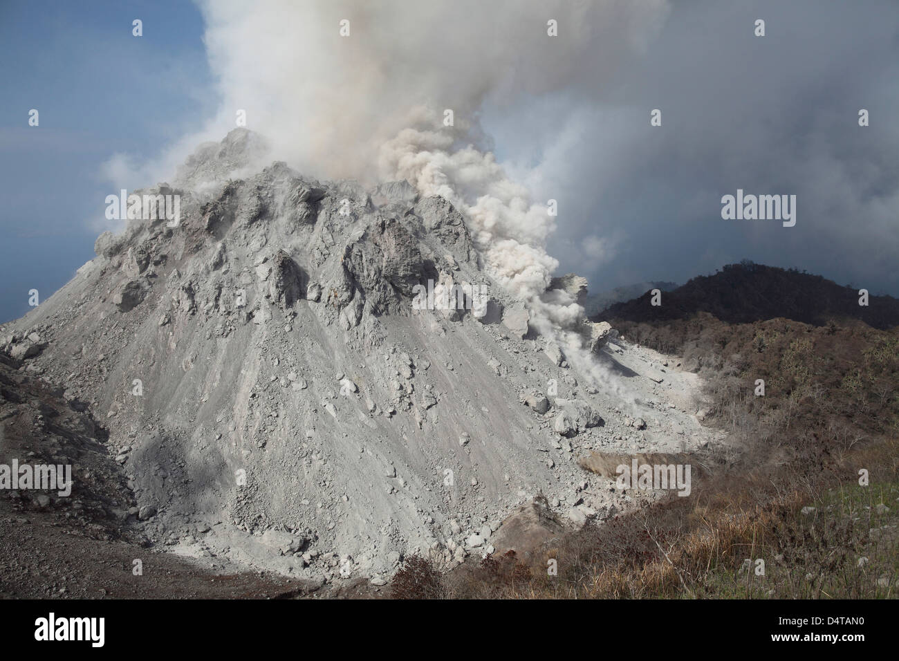Degassing Rerombola lava dome of Paluweh volcano, Indonesia Stock Photo ...