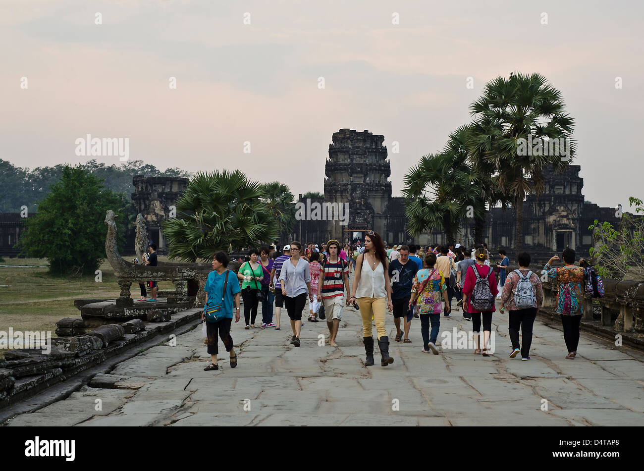 Tourists in the front of Angkor Wat Stock Photo - Alamy