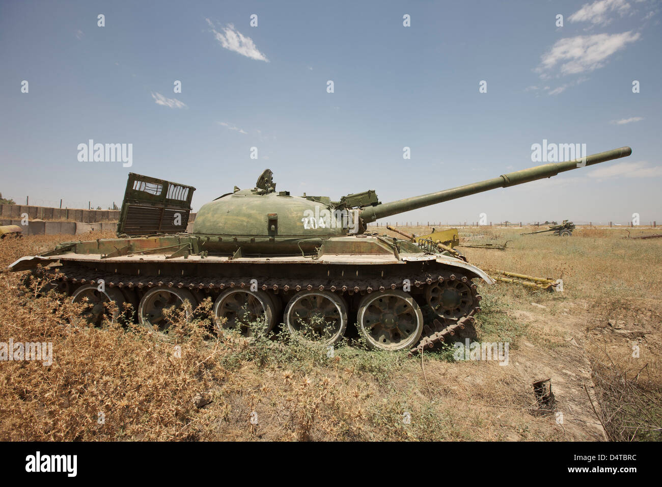 A Russian T-62 main battle tank rest in an armor junkyard in Kunduz ...