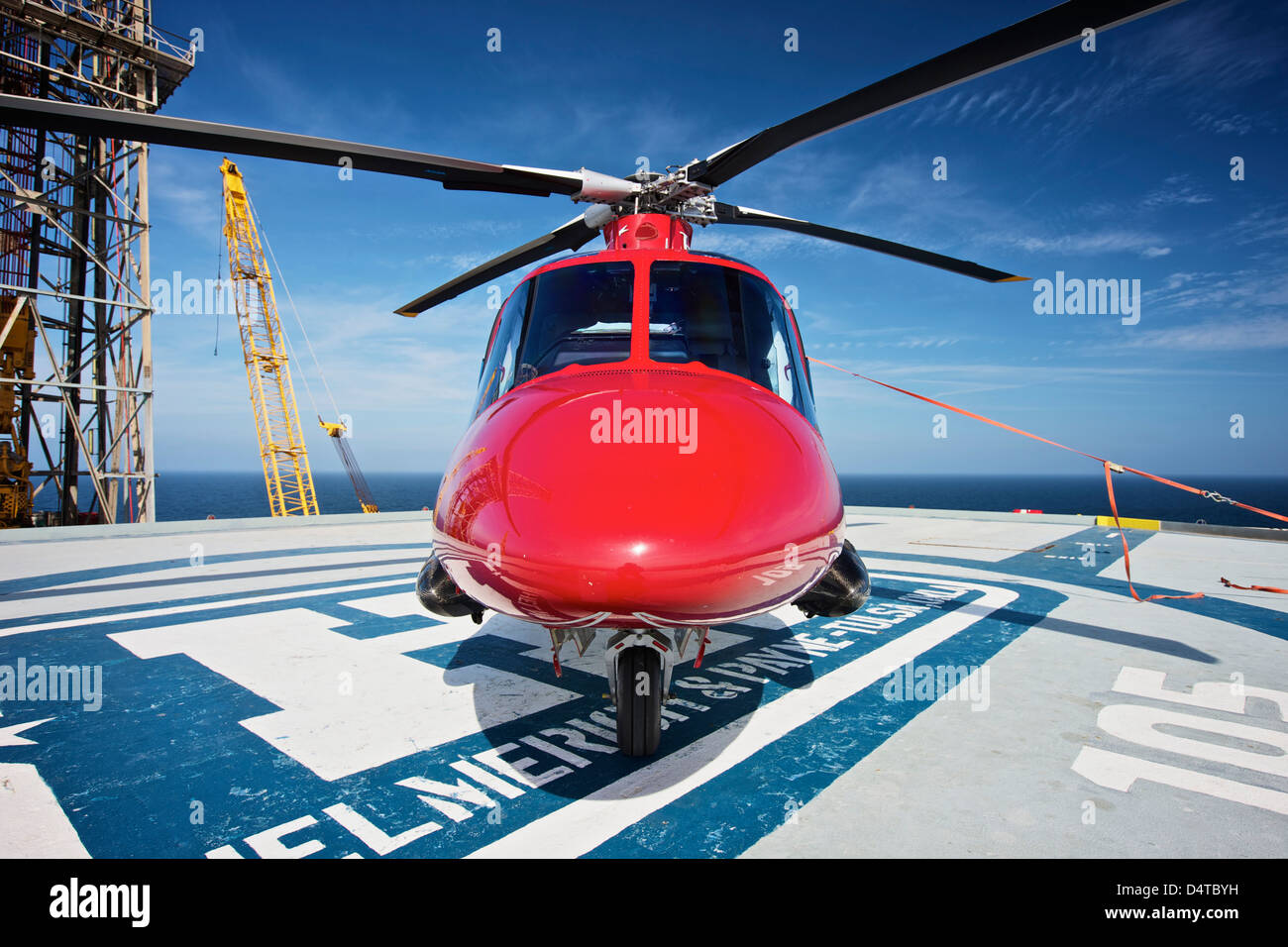 AgustaWestland AW109E helicopter parked on the helipad of an oil rig in ...