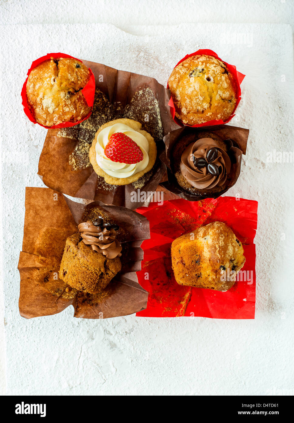 A colourful selection of muffins and cupcakes Stock Photo - Alamy