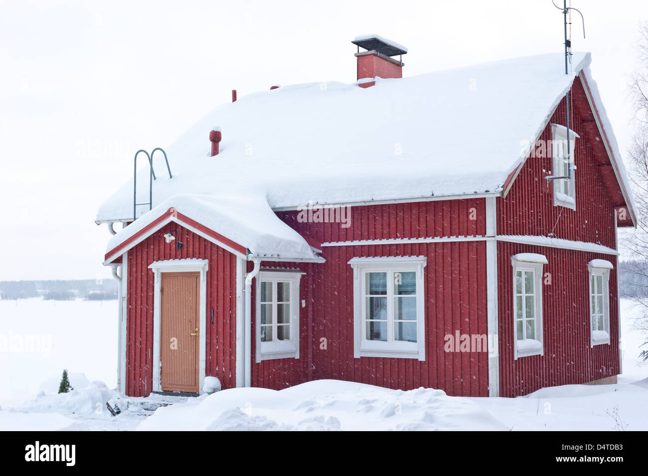Traditional finnish wooden farm house covered in snow in winter Stock ...