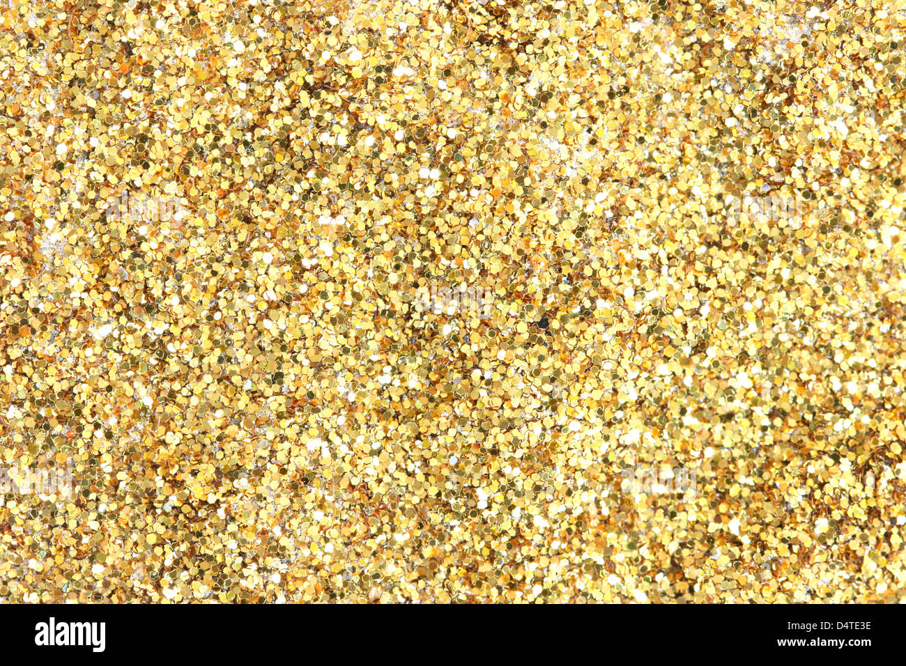 Many festive golden decoration pieces background Stock Photo - Alamy