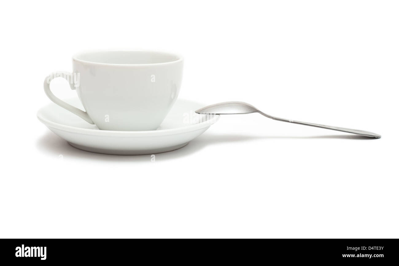 white cup with spoon and saucer isolated on white background Stock ...