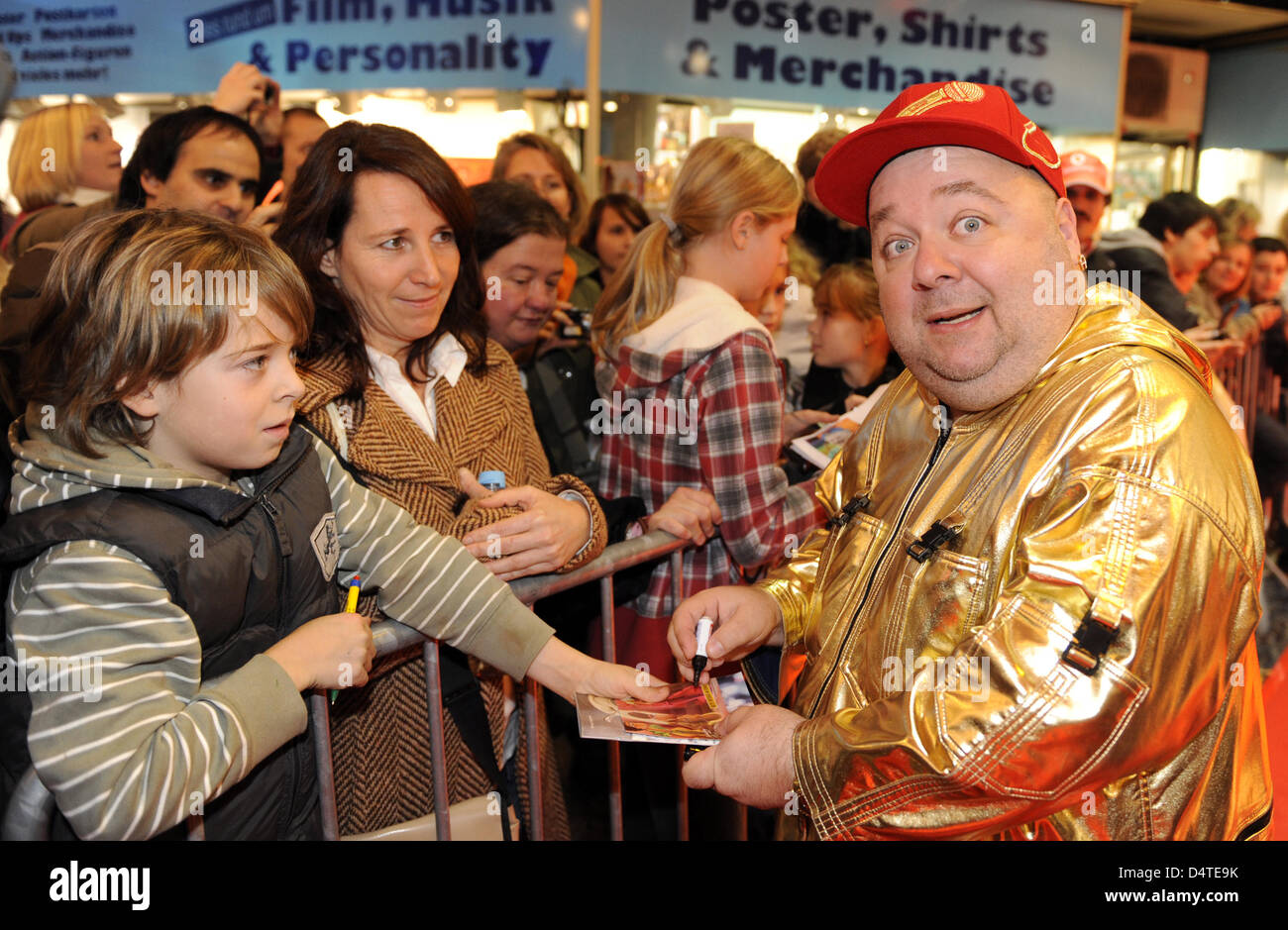 German comedian Dirk Bach signs autographs at the premiere of the ...