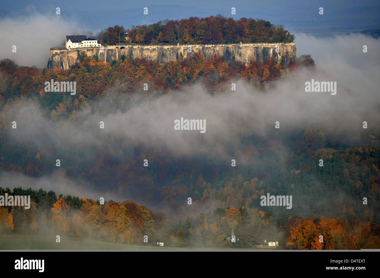 The foliage shines in autumnly colours in Saxon Switzerland near ...
