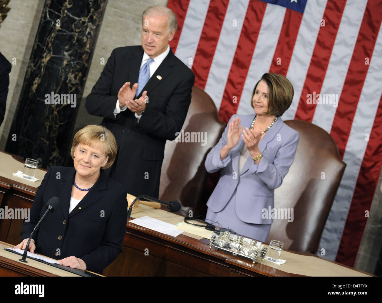 German Chancellor Angela Merkel receives standing ovations after her ...