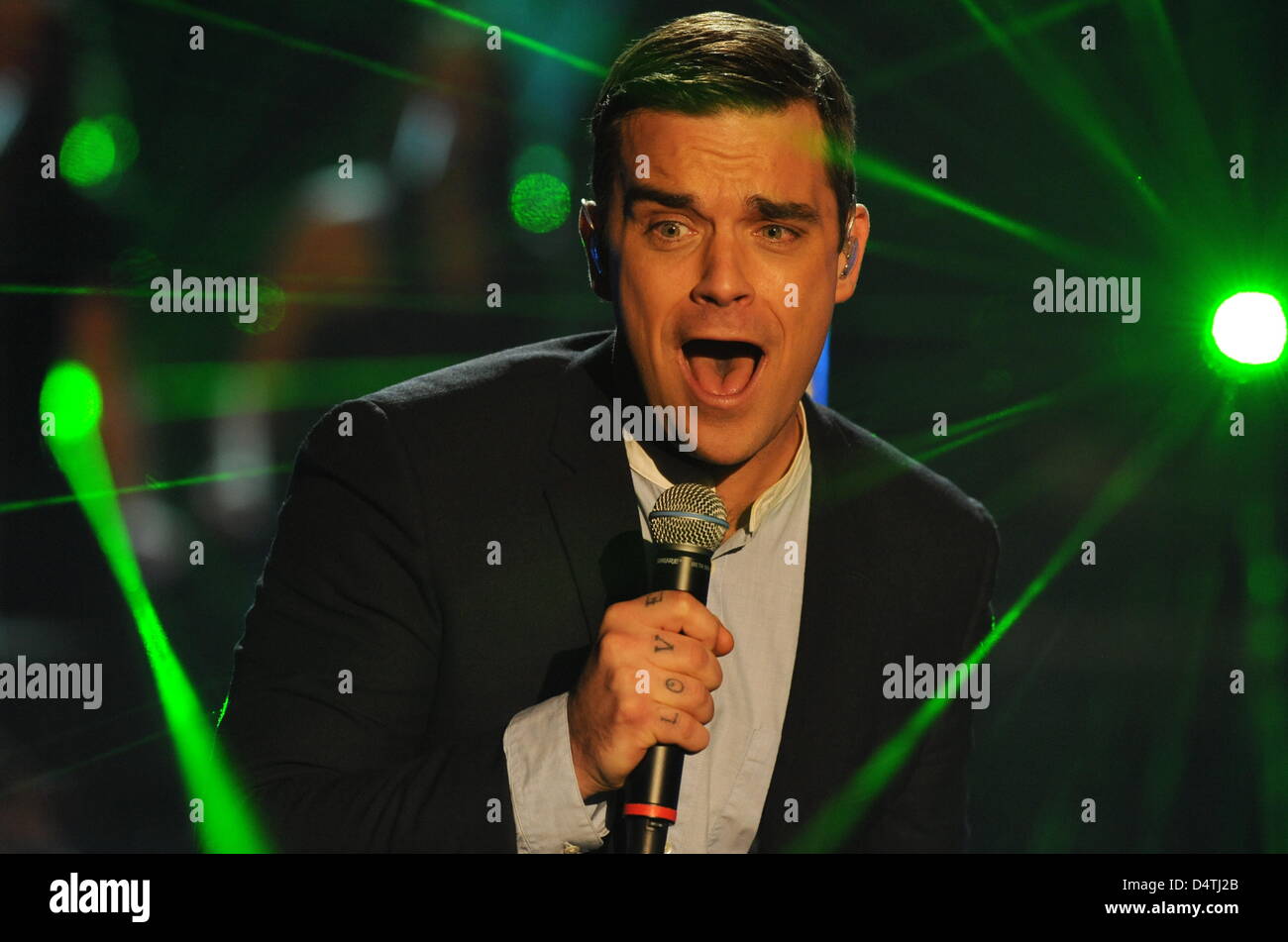 Singer Robbie Williams performs during the German television show ...