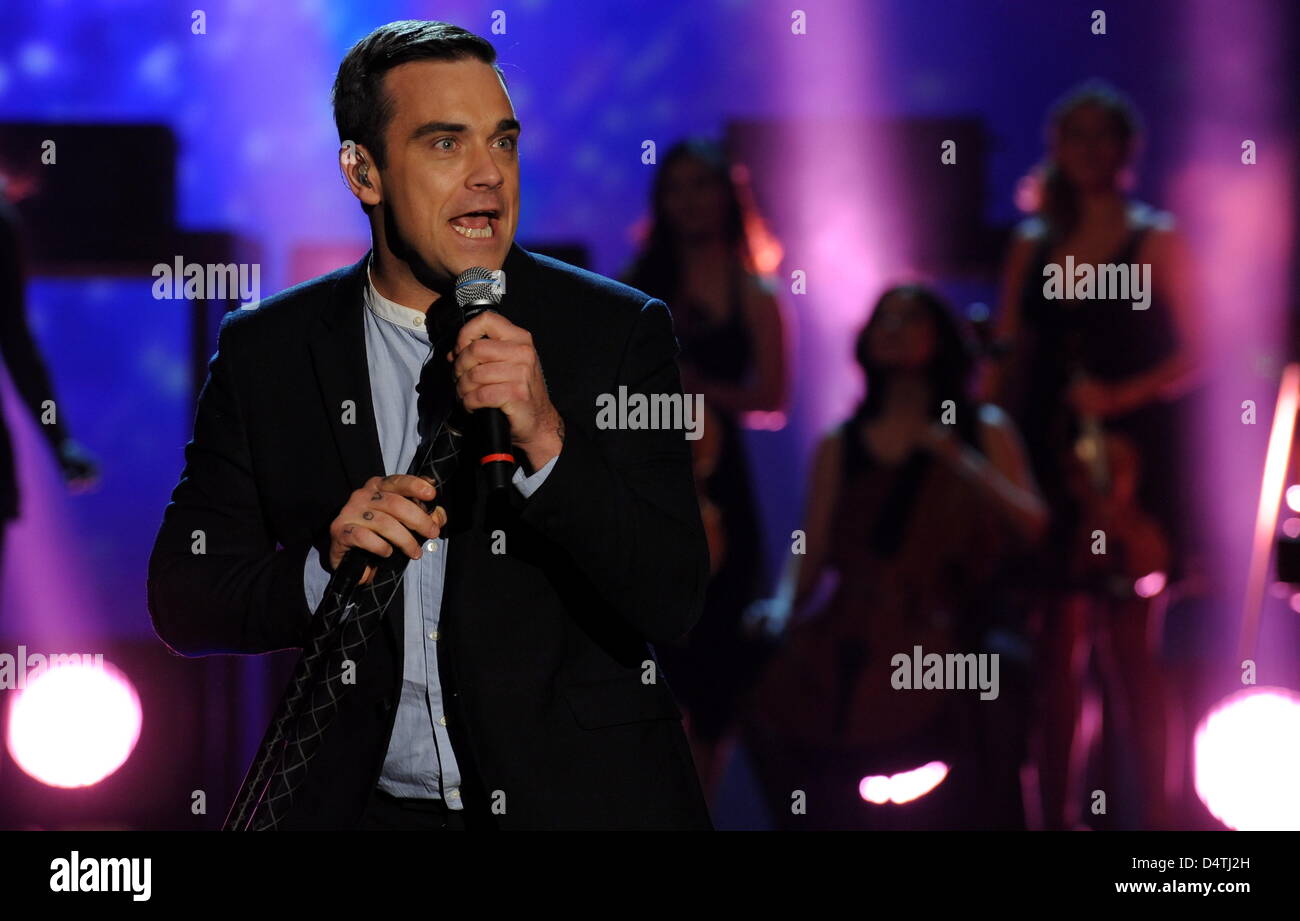 Singer Robbie Williams performs during the German television show ...