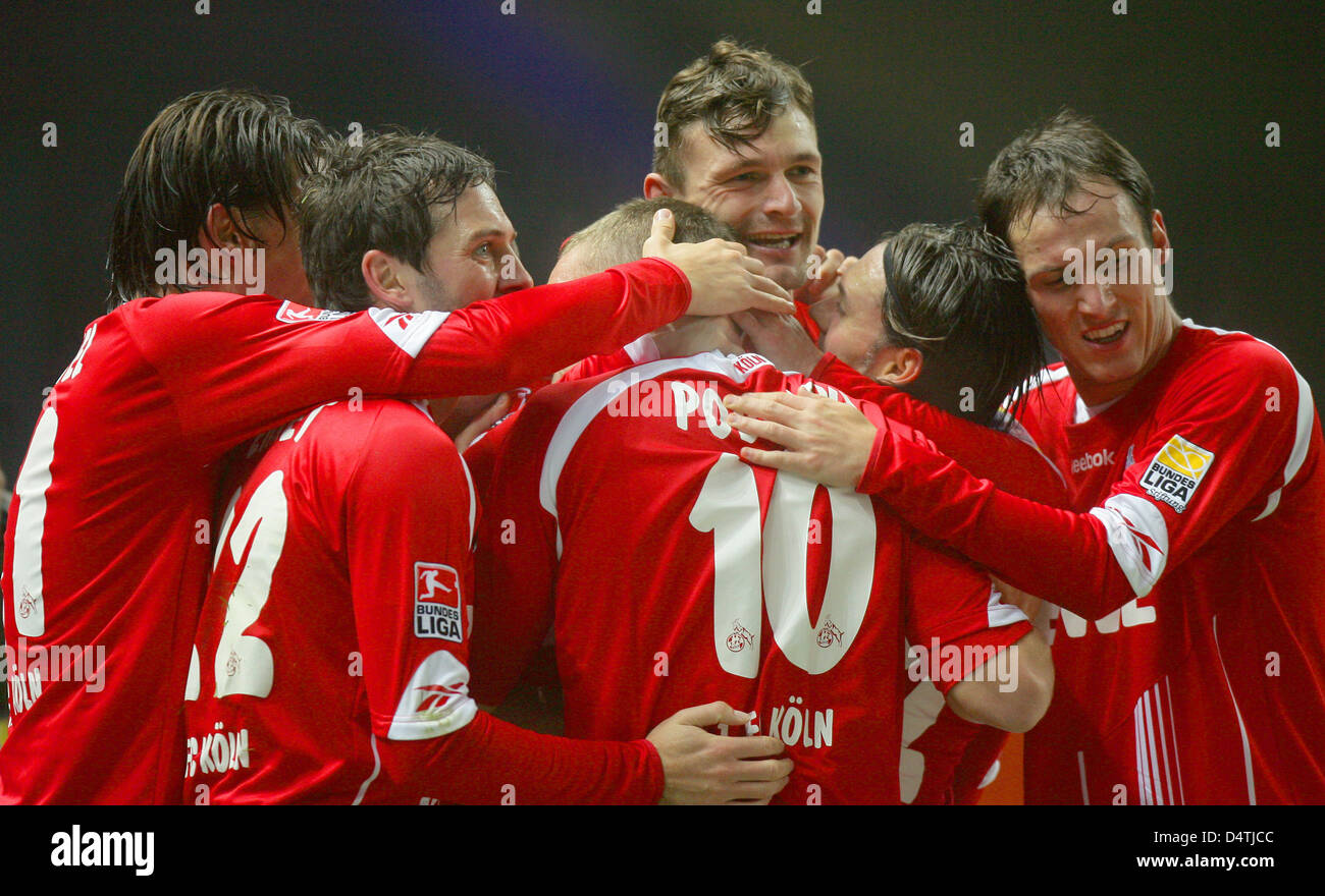 Cologne?s Milivoje Novakovic (C) cheers with his teammates after ...