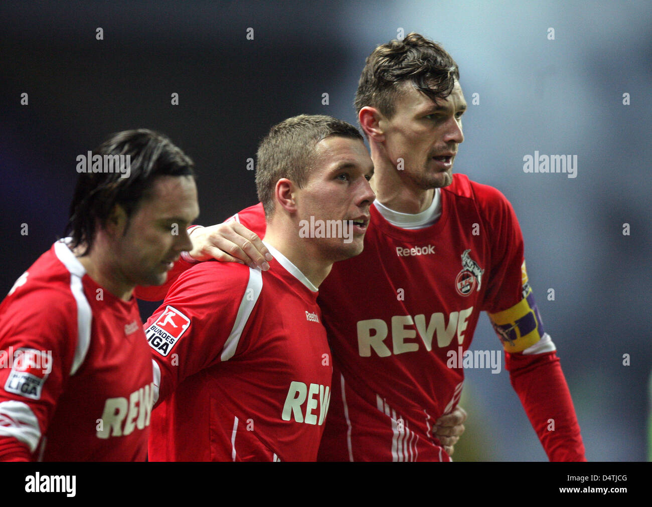 Cologne?s Milivoje Novakovic (R) cheers with his teammates Lukas ...